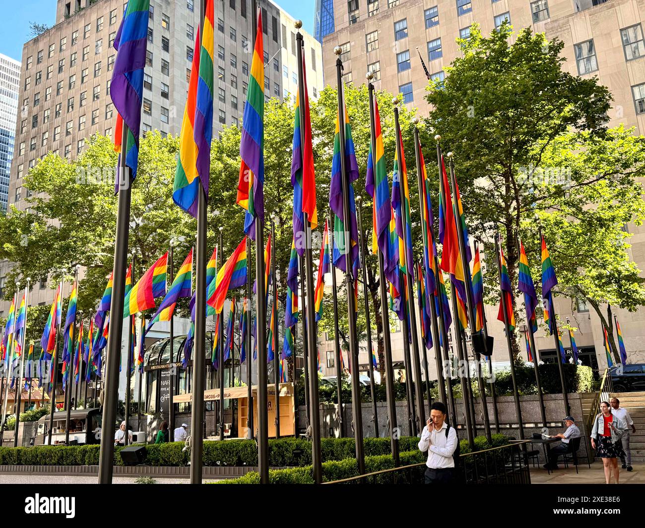 New York, New York, USA. 25th June, 2024. Pride flags seen on display at Rockefeller Center in ...