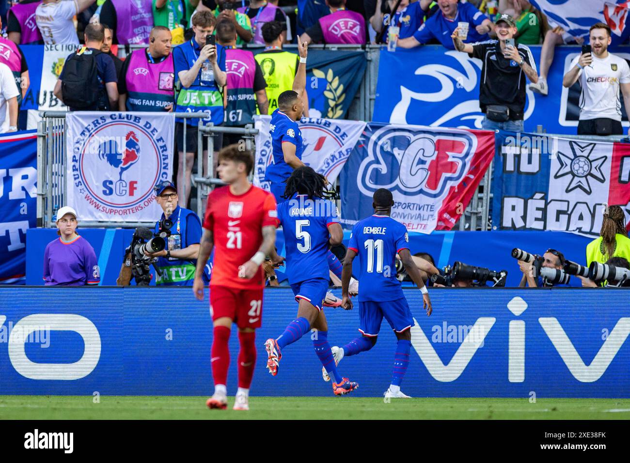 Kylian Mbappe (C) of France celebrates a goal with Jules Kounde and ...