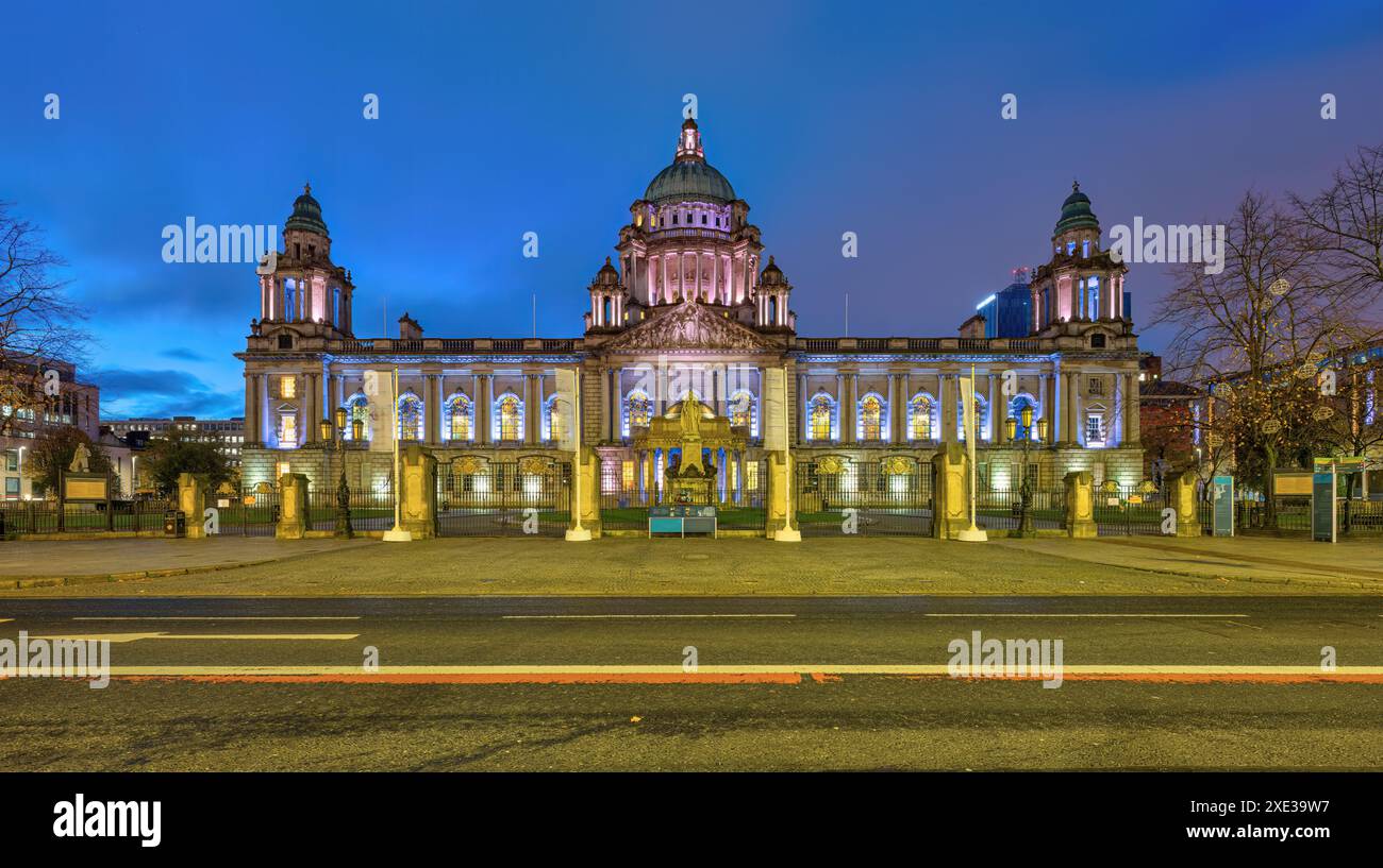 The imposing Belfast City Hall illuminated at dawn Stock Photo - Alamy
