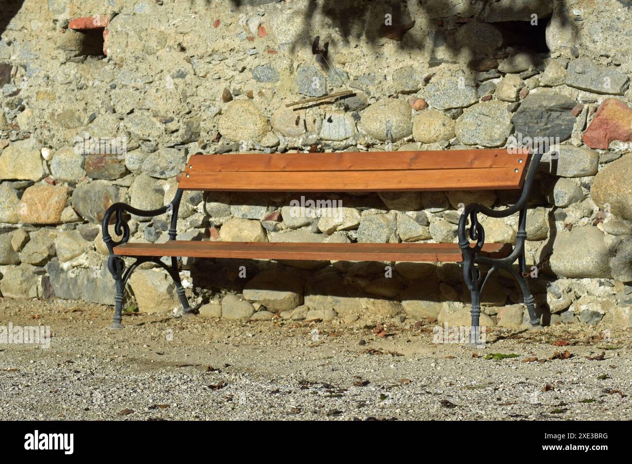 Wooden bench at the Neustift monastery in South Tyrol Stock Photo - Alamy