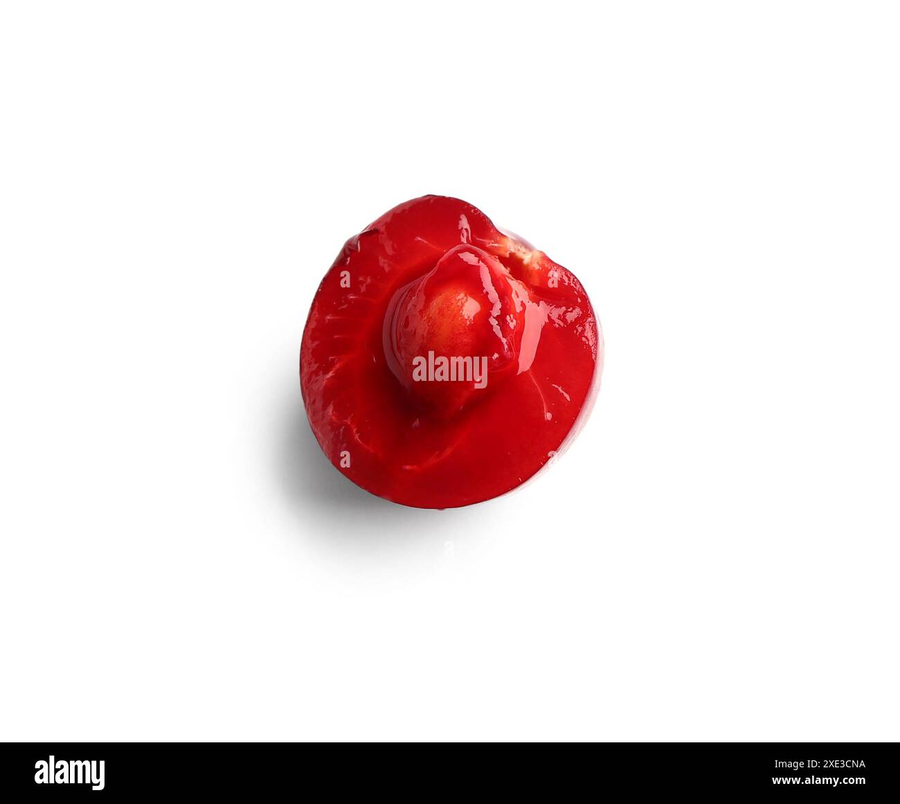 Half of red sweet cherry on white background Stock Photo - Alamy