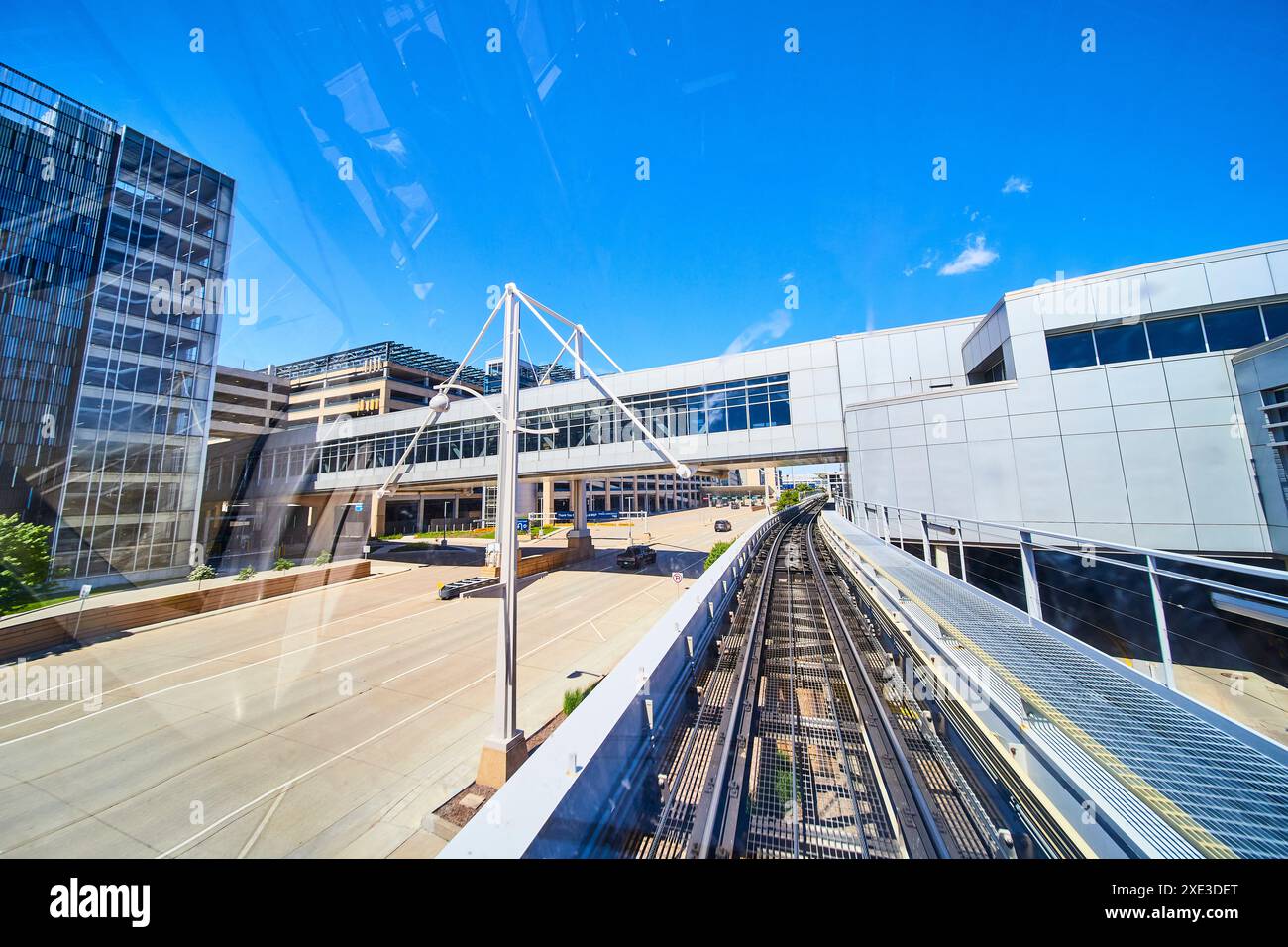 Modern Train Station and Pedestrian Bridge from Track Level Stock Photo ...