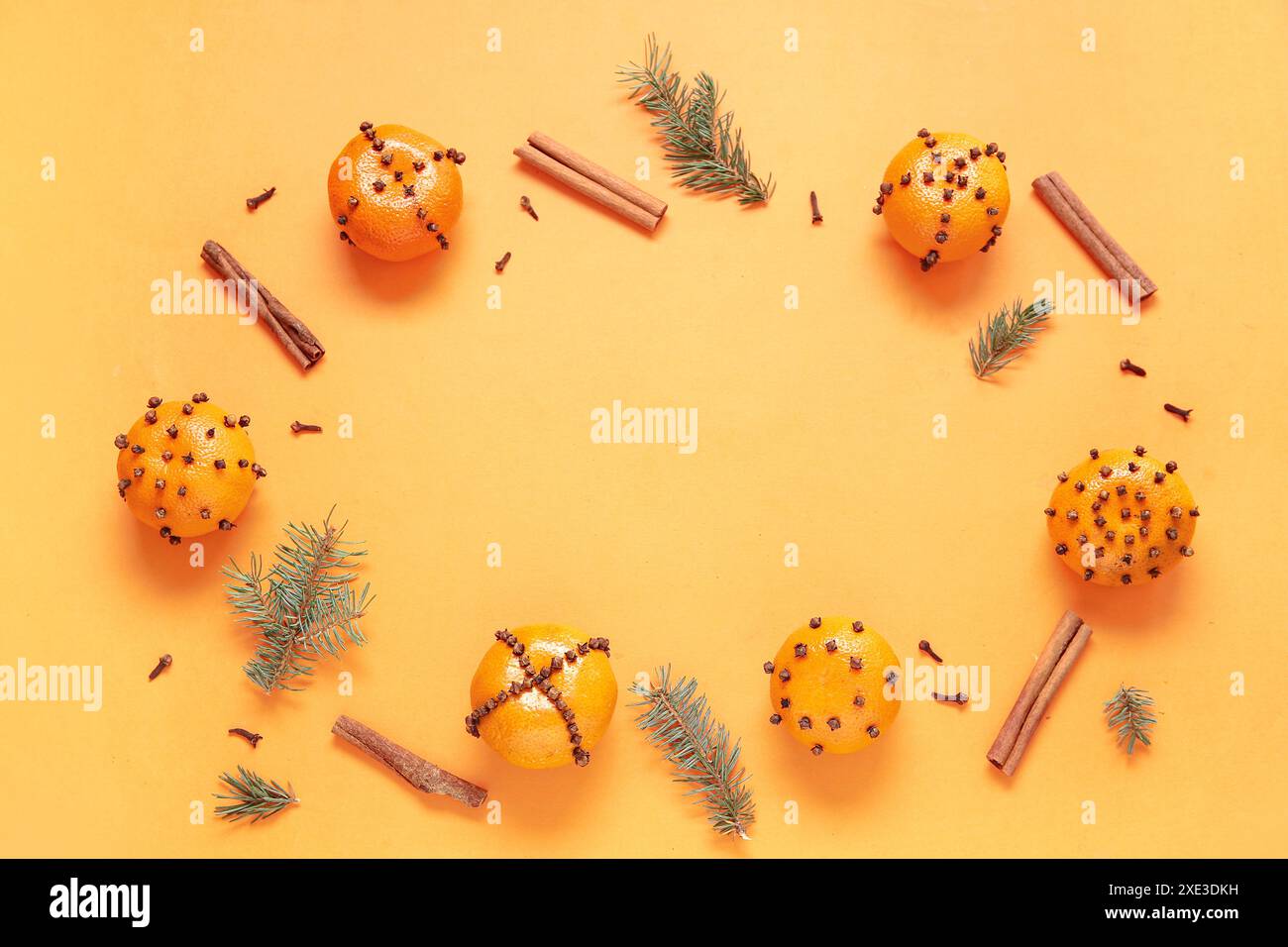 Frame made of pomander balls with Christmas tree branches and cinnamon ...