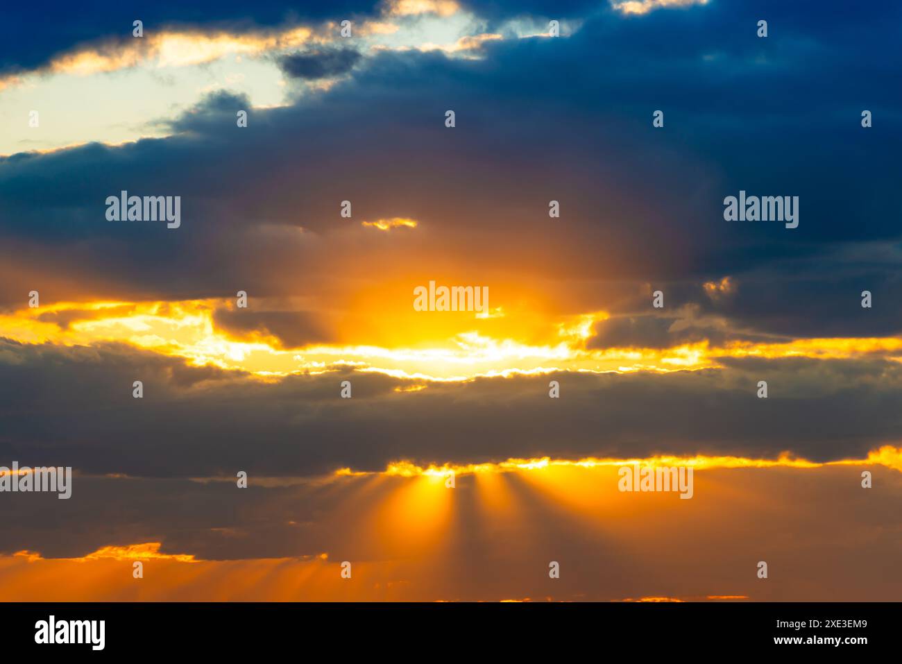 Sunset sky with sunset clouds and sun rays Stock Photo - Alamy