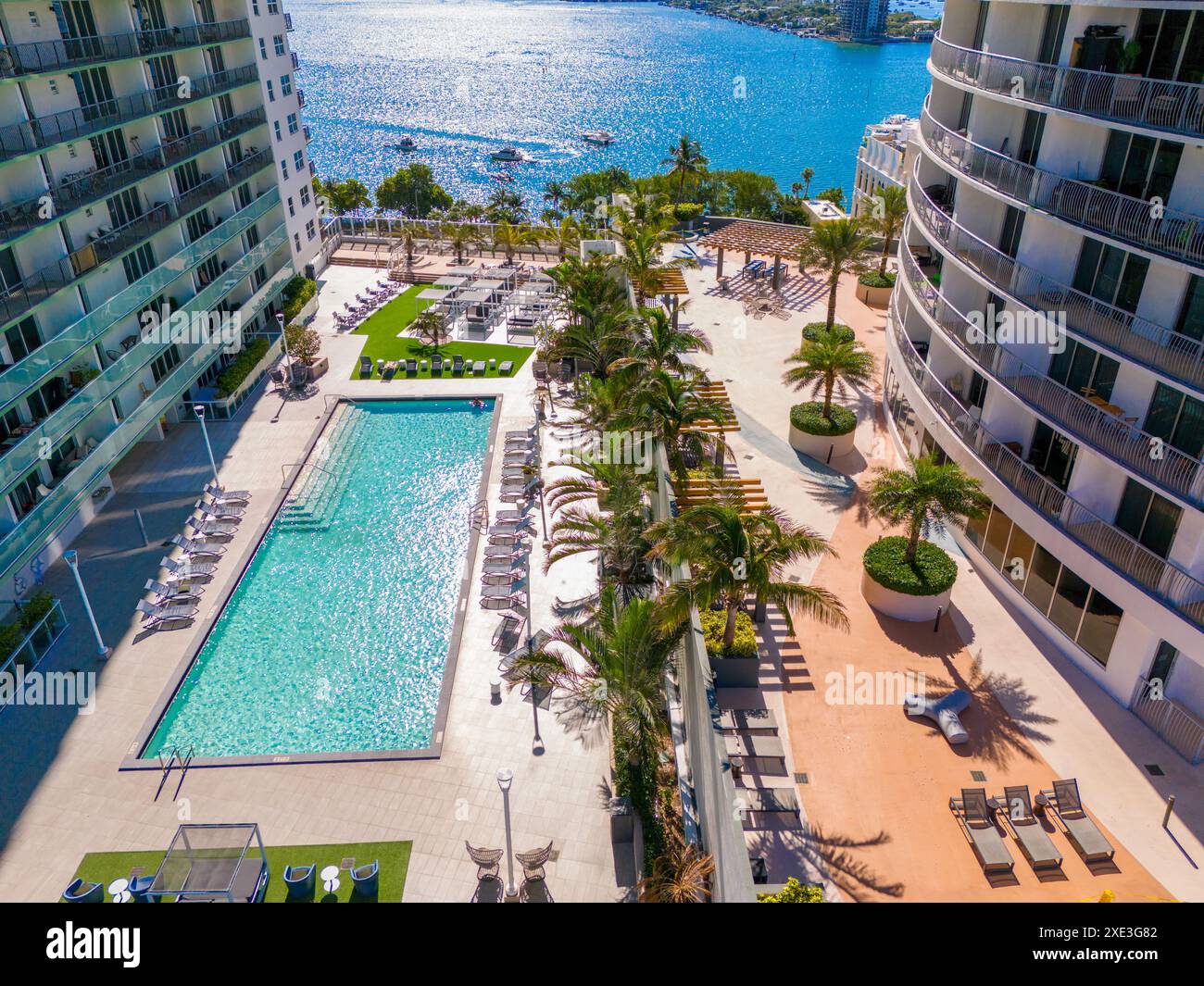 Miami, FL, USA - May 23, 2024: Aerial photo pool decks at Opera Tower ...