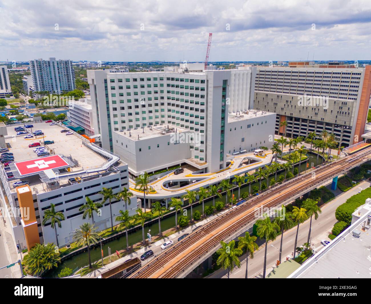 Drone photo Miami hospitals. View of buildings by canal and palms ...