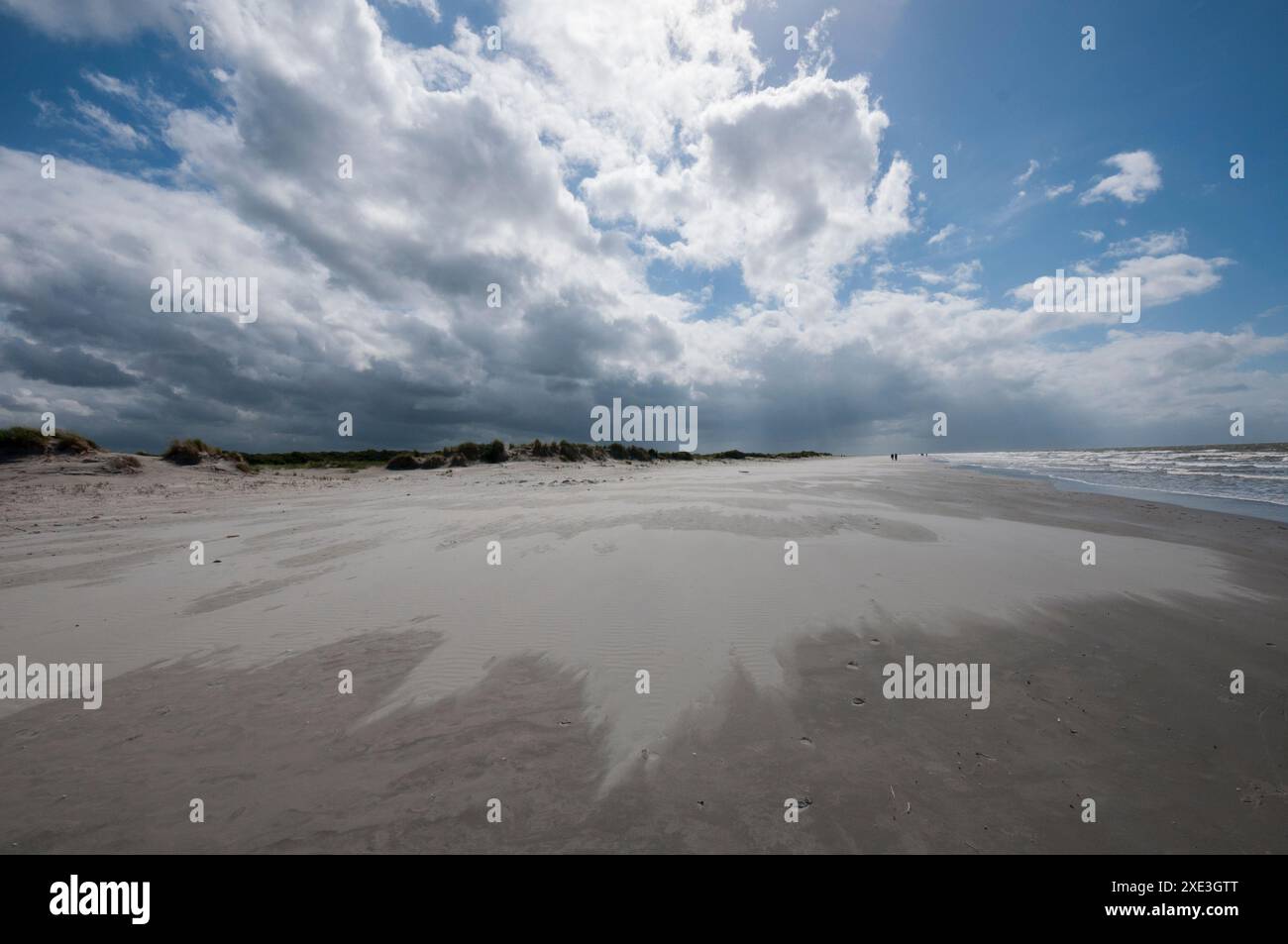 Cold sunny weather with storm and heavy clouds on the beach of the ...