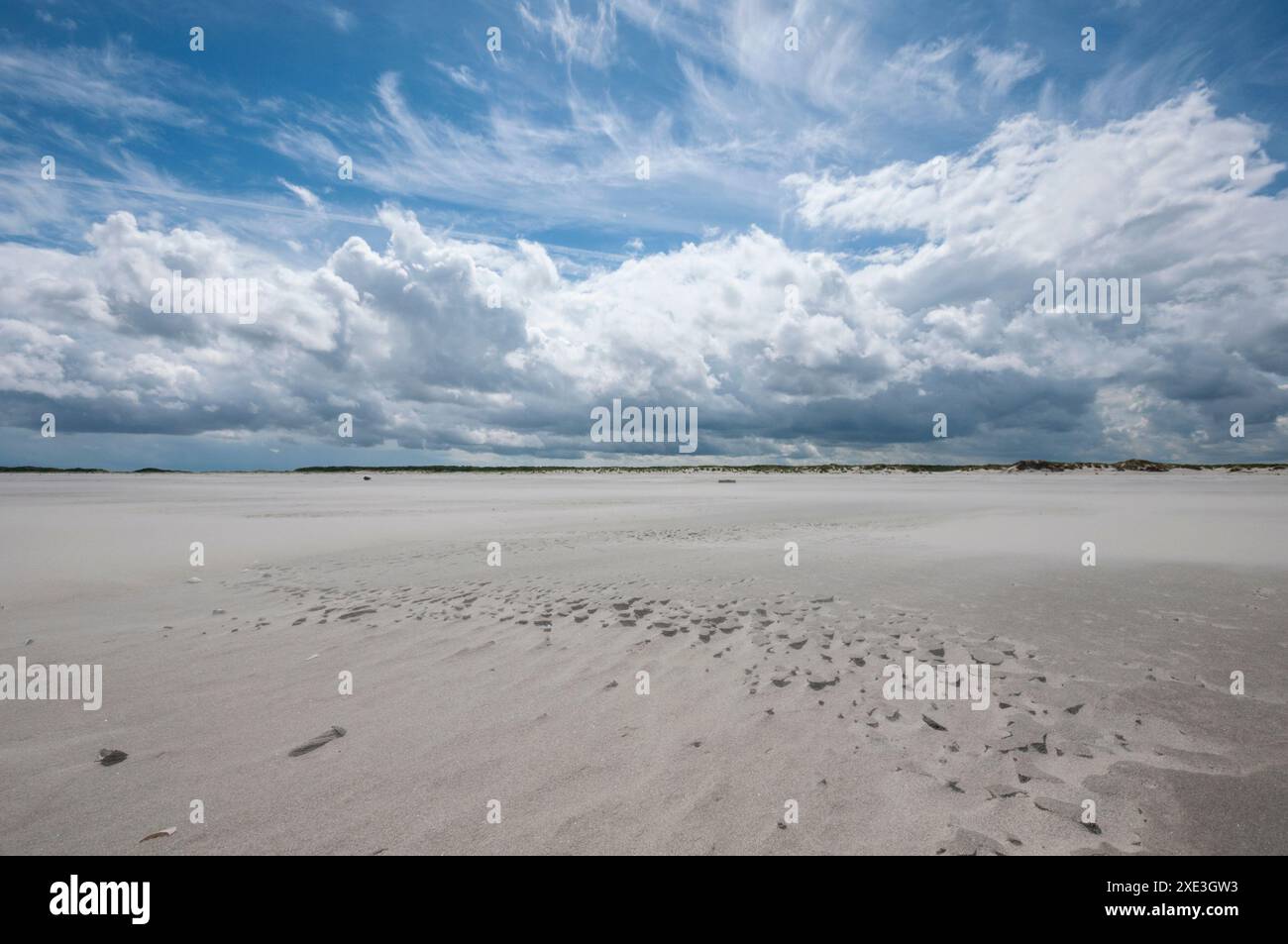 Cold sunny weather with storm and heavy clouds on the beach of the ...