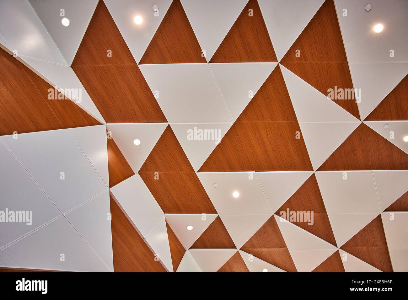 Geometric Ceiling Design with Triangular Panels and Recessed Lighting ...