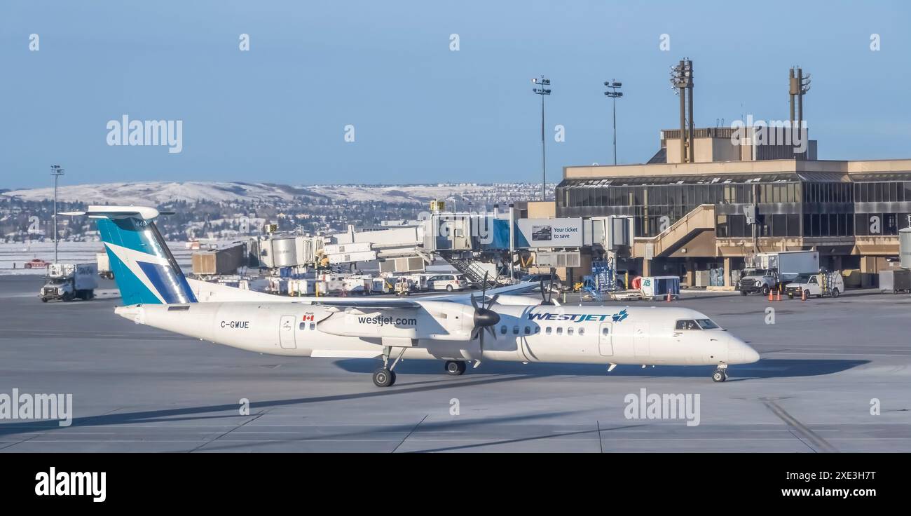 Alberta, Calgary, Canada. Dec 11, 2023. A Westjet airplane De Havilland ...