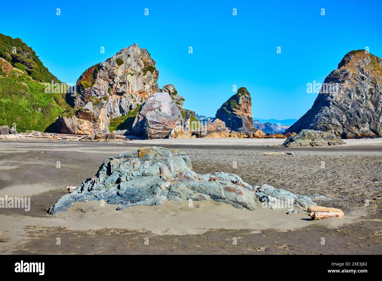 Rugged Rock Formations and Sandy Beach at Ground Level Stock Photo - Alamy