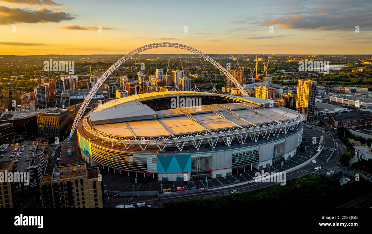 Aerial view of concert at Wembley stadium at sunset in London, England ...