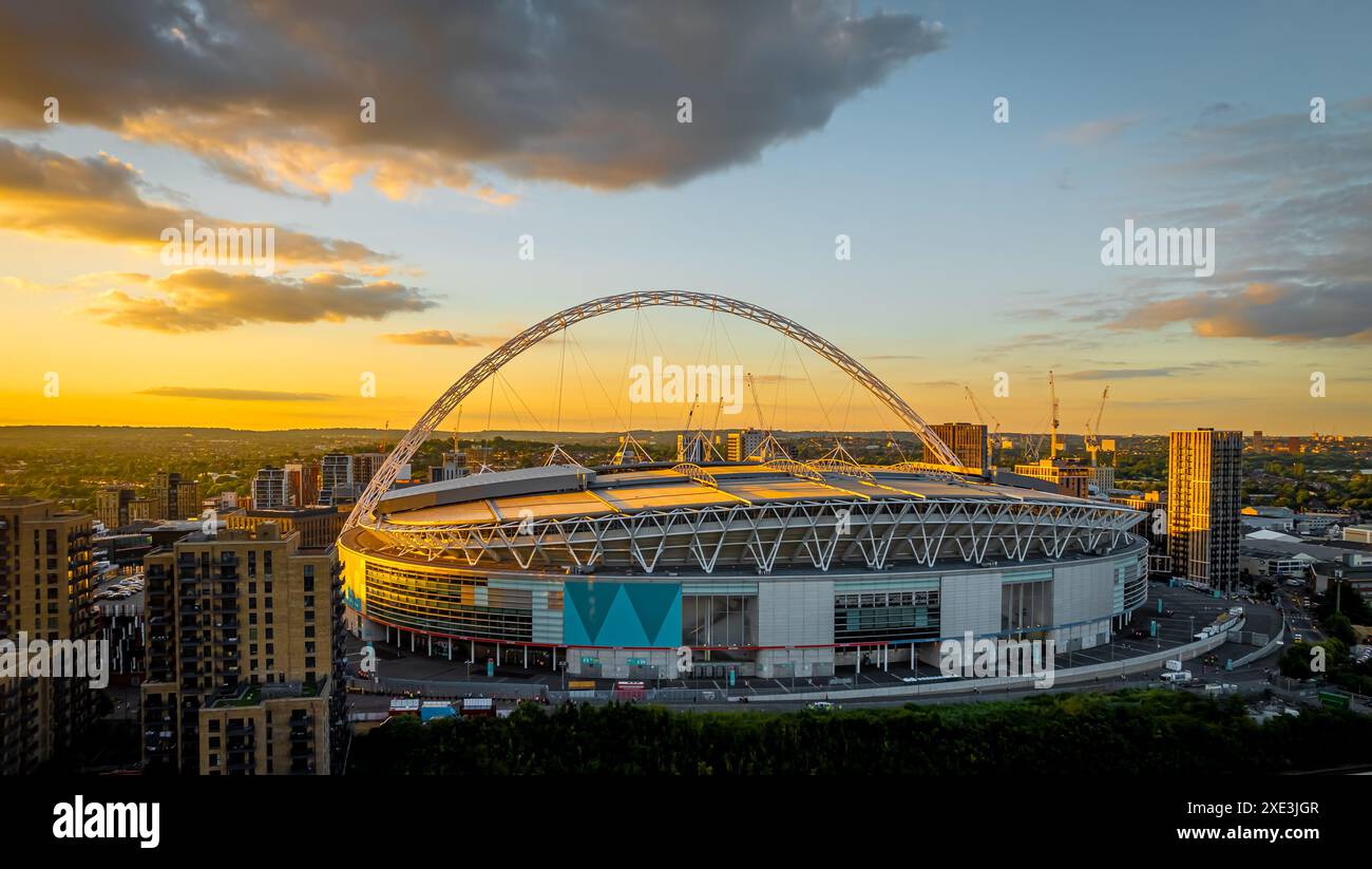 Aerial view of concert at Wembley stadium at sunset in London, England ...