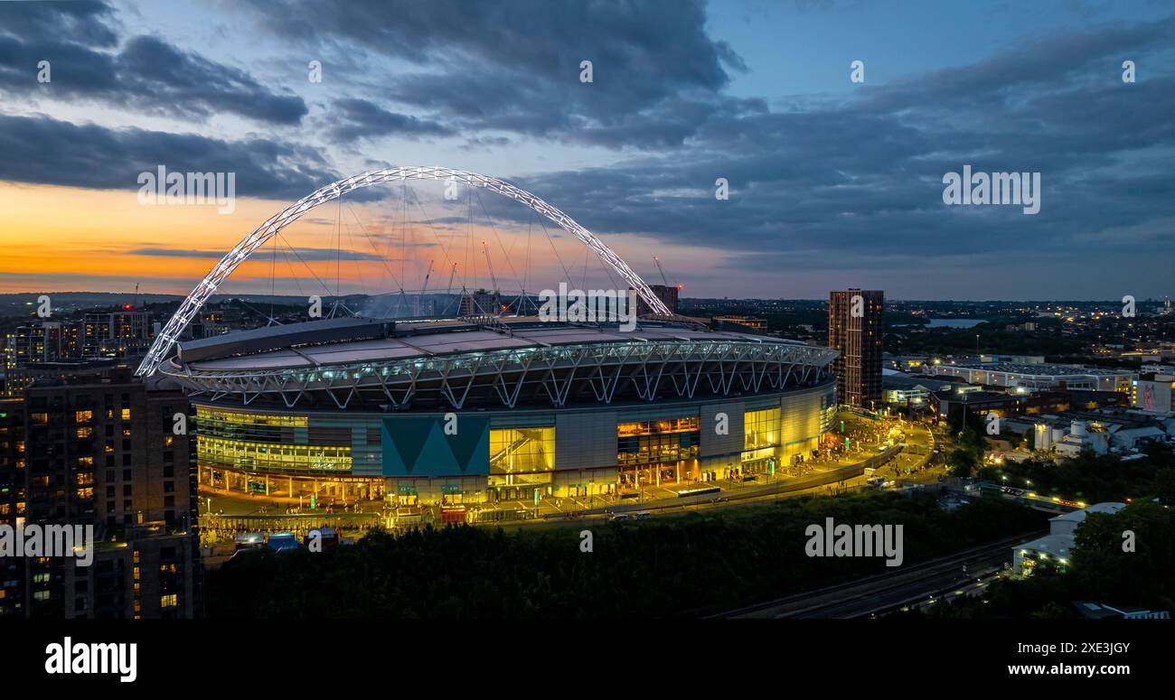 Aerial view of concert at Wembley stadium at sunset in London, England ...