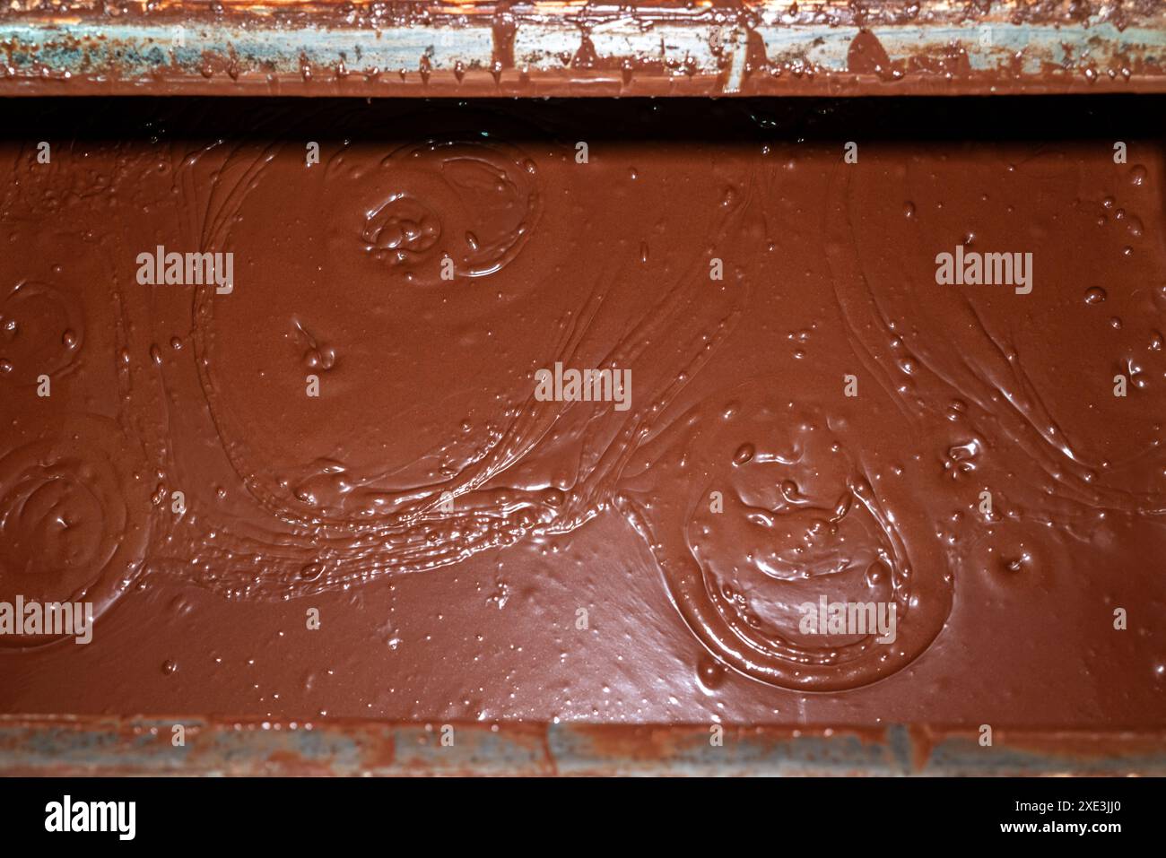 Conching chocolate for refining Stock Photo - Alamy