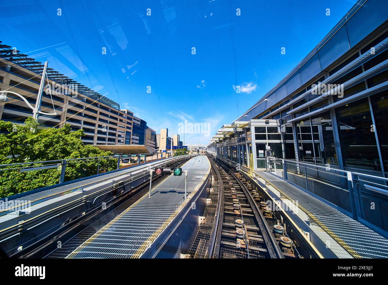 Modern Urban Transit Station with Curving Tracks from Driver's View ...