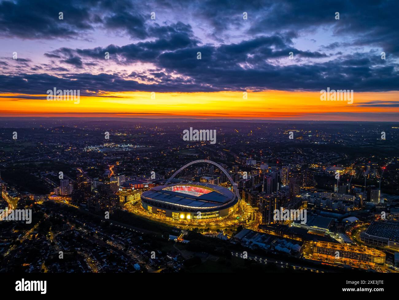 Aerial view of concert at Wembley stadium at sunset in London, England ...