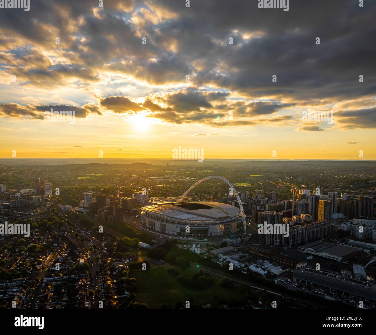 Aerial view of concert at Wembley stadium at sunset in London, England ...