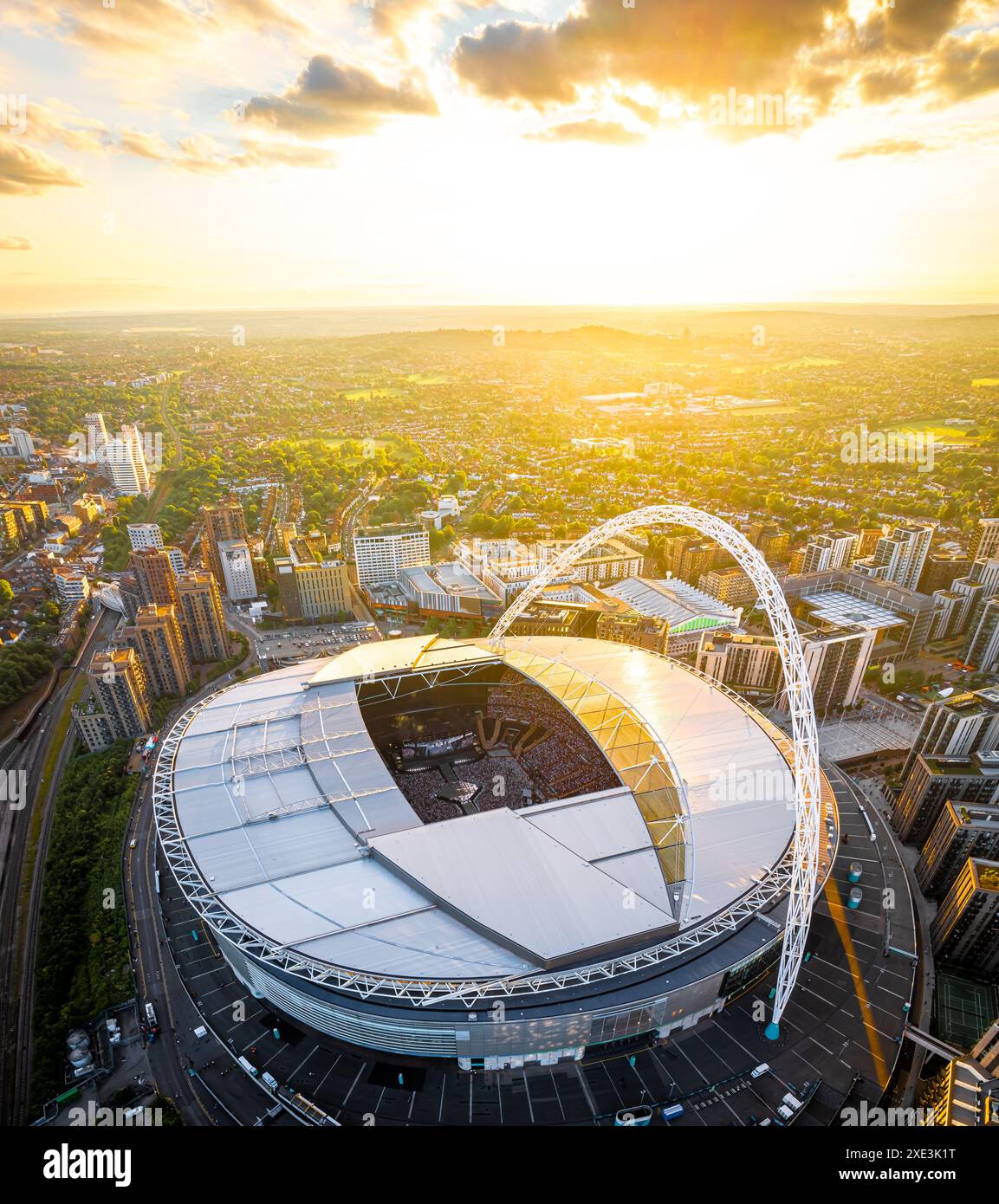 Aerial view of concert at Wembley stadium at sunset in London, England ...