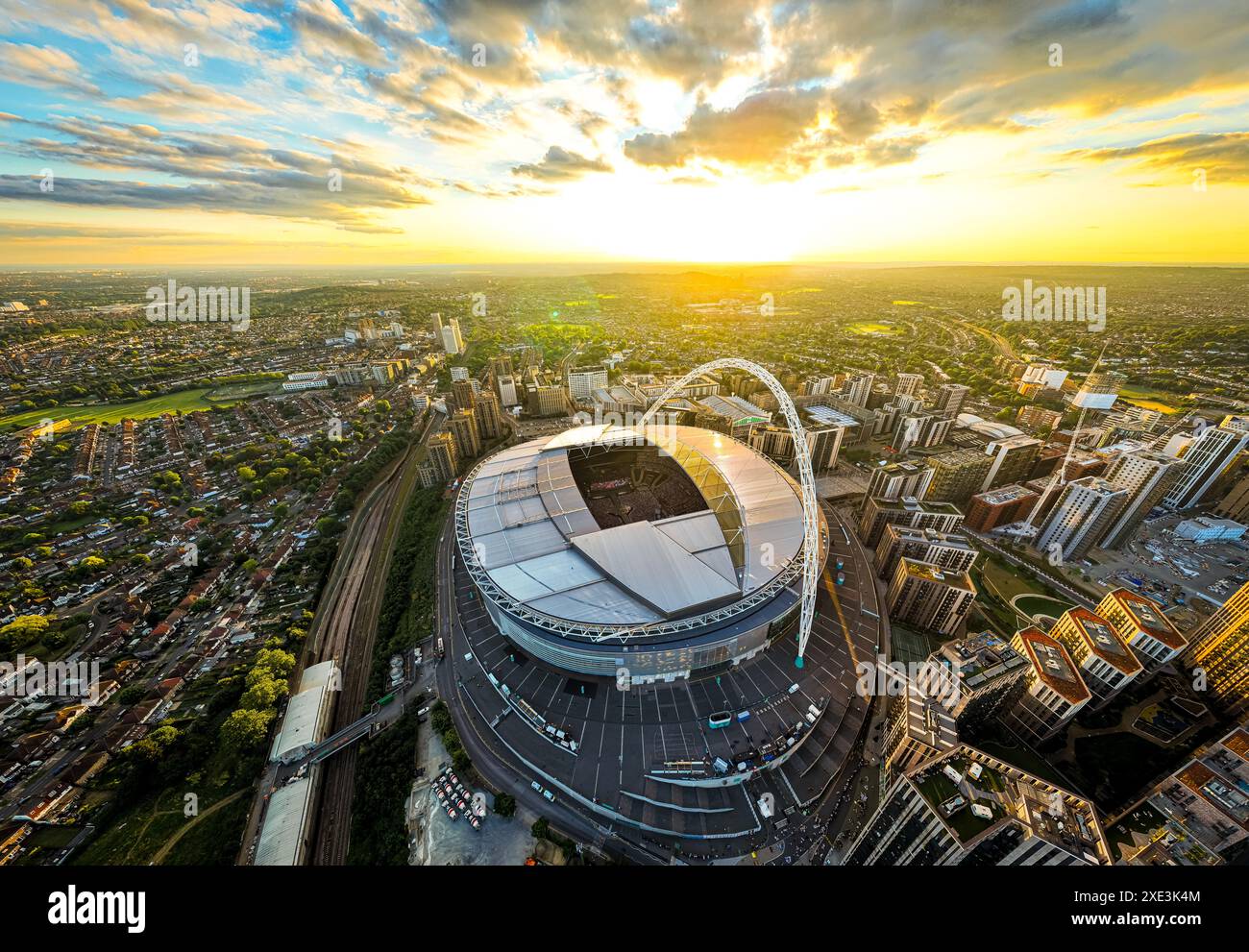 Aerial view of concert at Wembley stadium at sunset in London, England ...