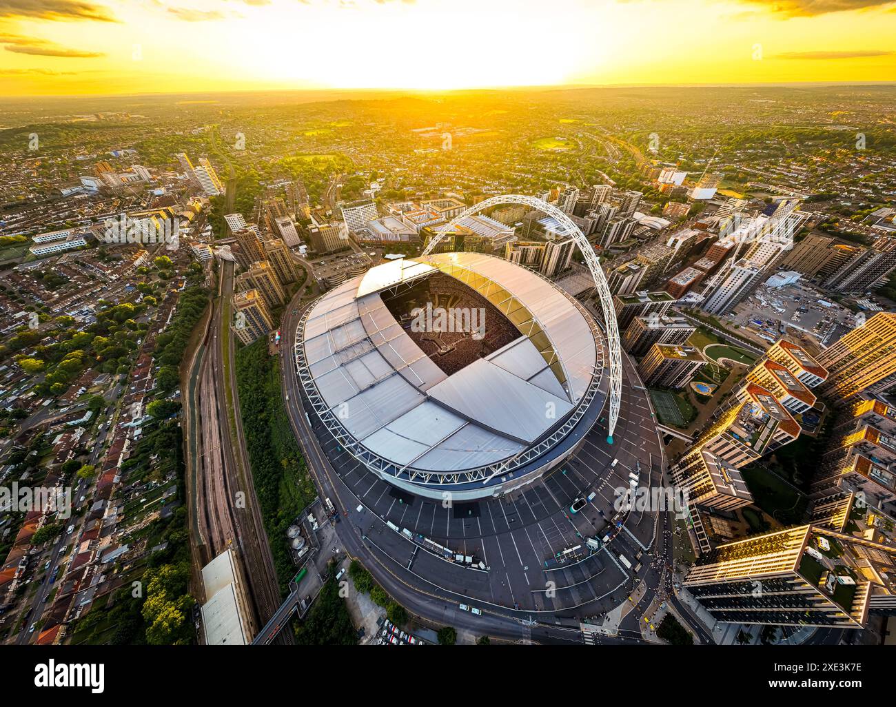 Aerial view of concert at Wembley stadium at sunset in London, England ...
