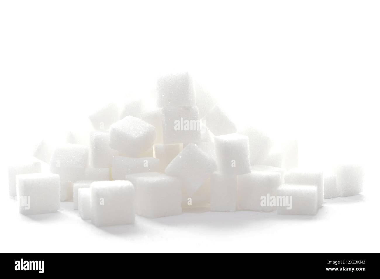 Dissolving sugar cube Cut Out Stock Images & Pictures - Alamy