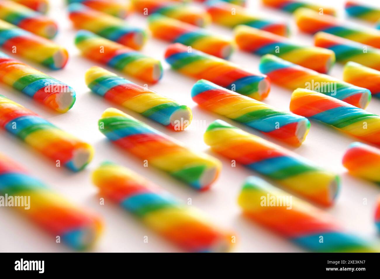 Blurred Twisted candy cane colorful seamless borders set. Stick of hard ...