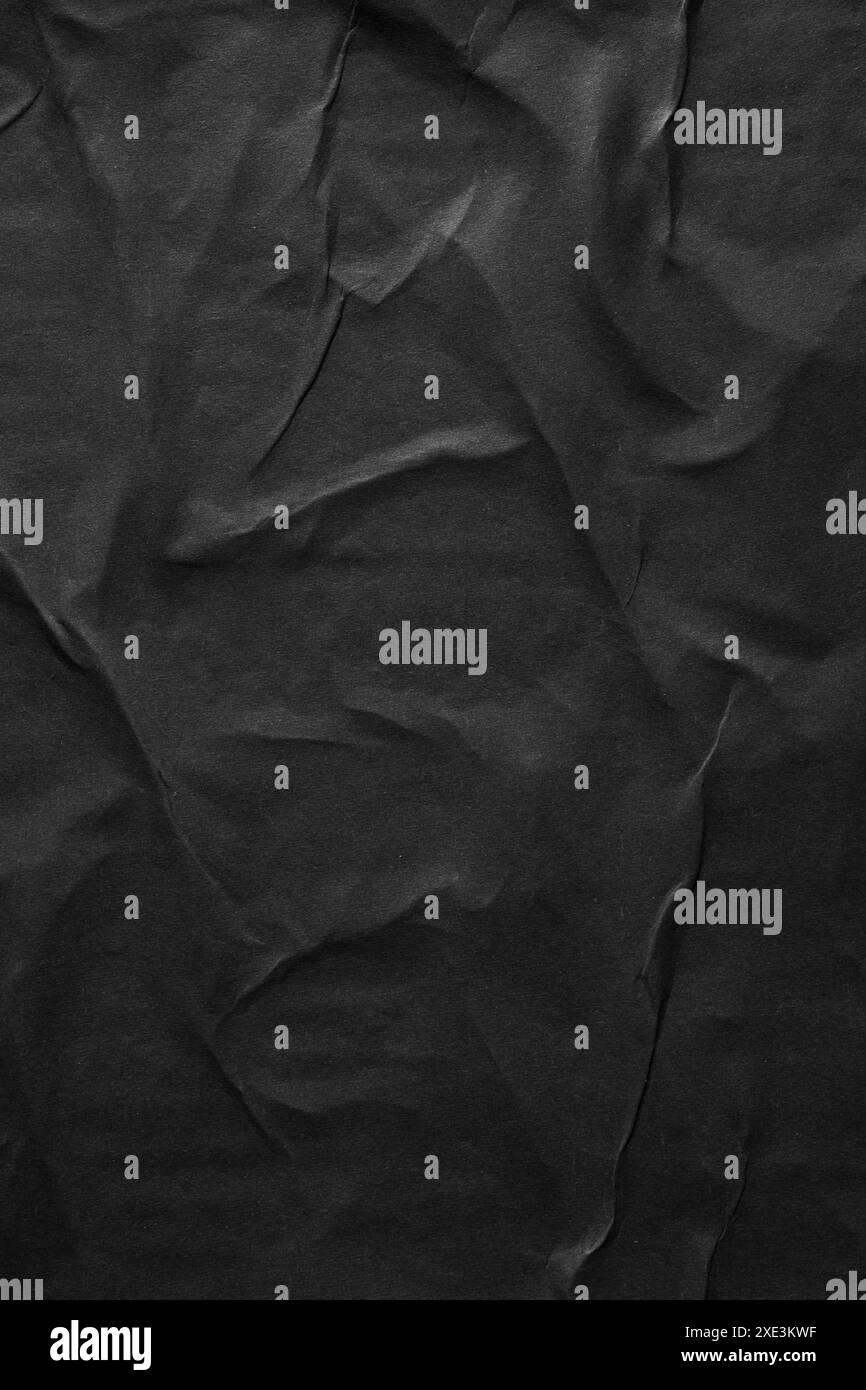 Vertical black paper poster texture background Stock Photo - Alamy