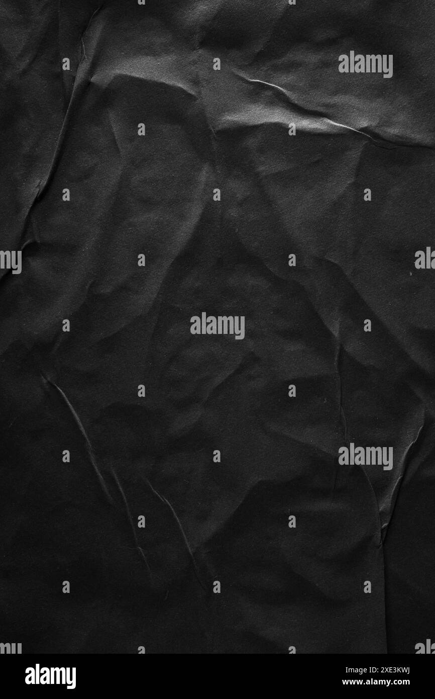 Vertical black paper poster texture background Stock Photo - Alamy