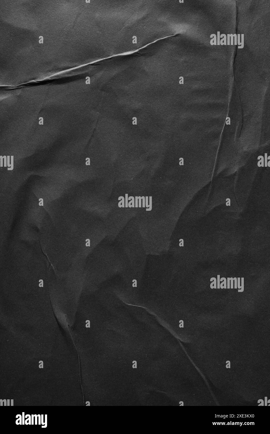 Vertical black paper poster texture background Stock Photo - Alamy