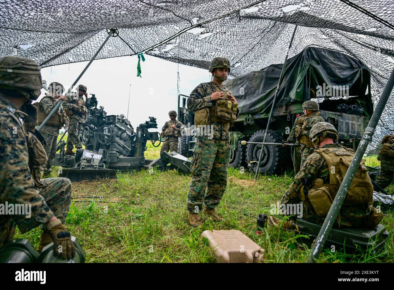 After live-firing a M777 A2 howitzer, U.S. Marines assigned to Battery ...