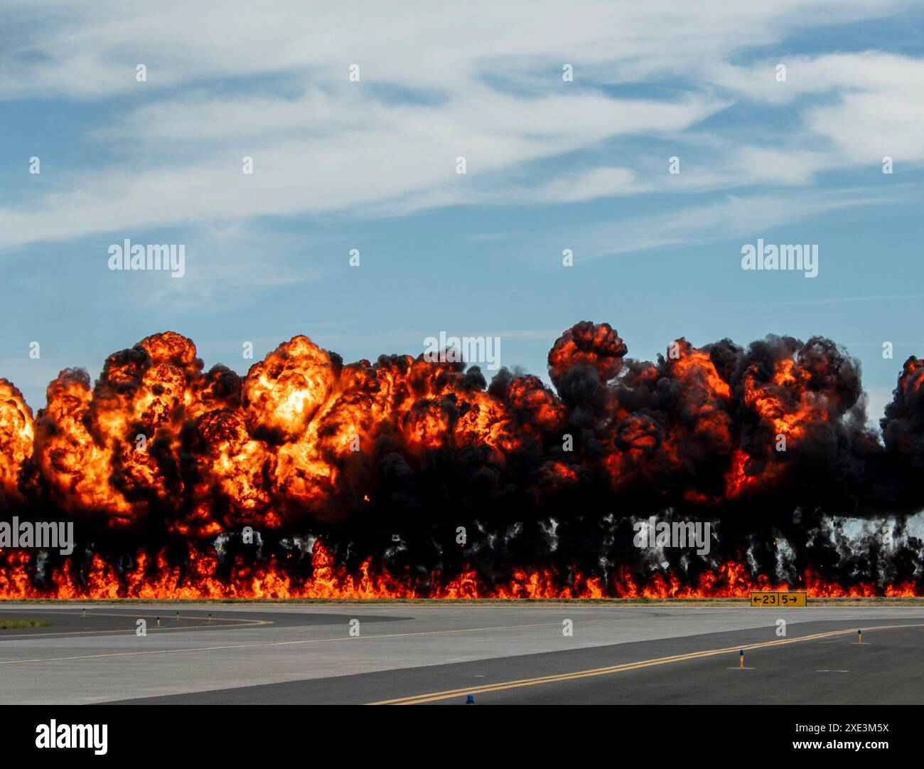 A Firewalkers Pyrotechnics wall of fire is on display during the ...