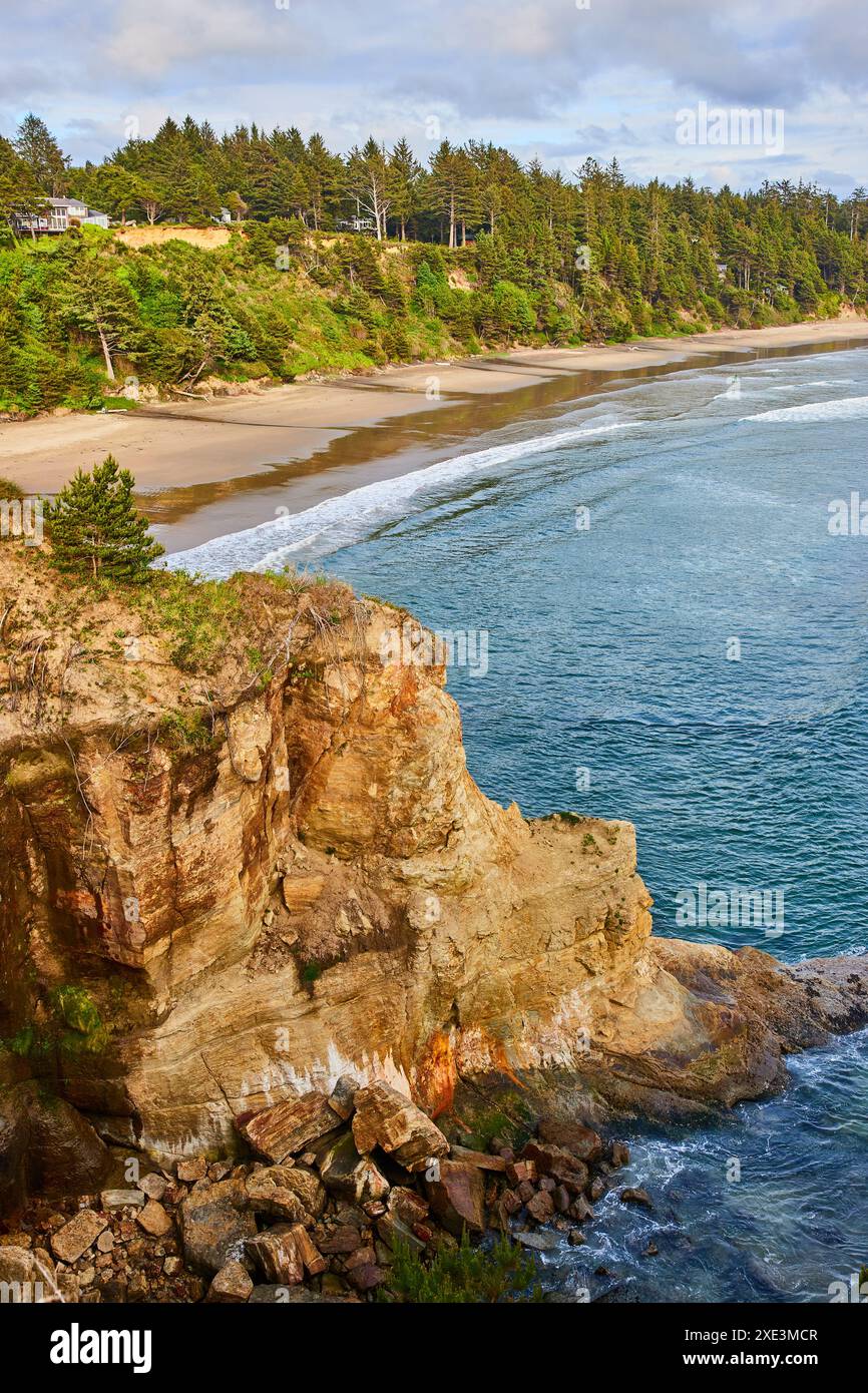 Rugged Cliff and Forest Overlooking Calm Beach at Devil's Punchbowl ...