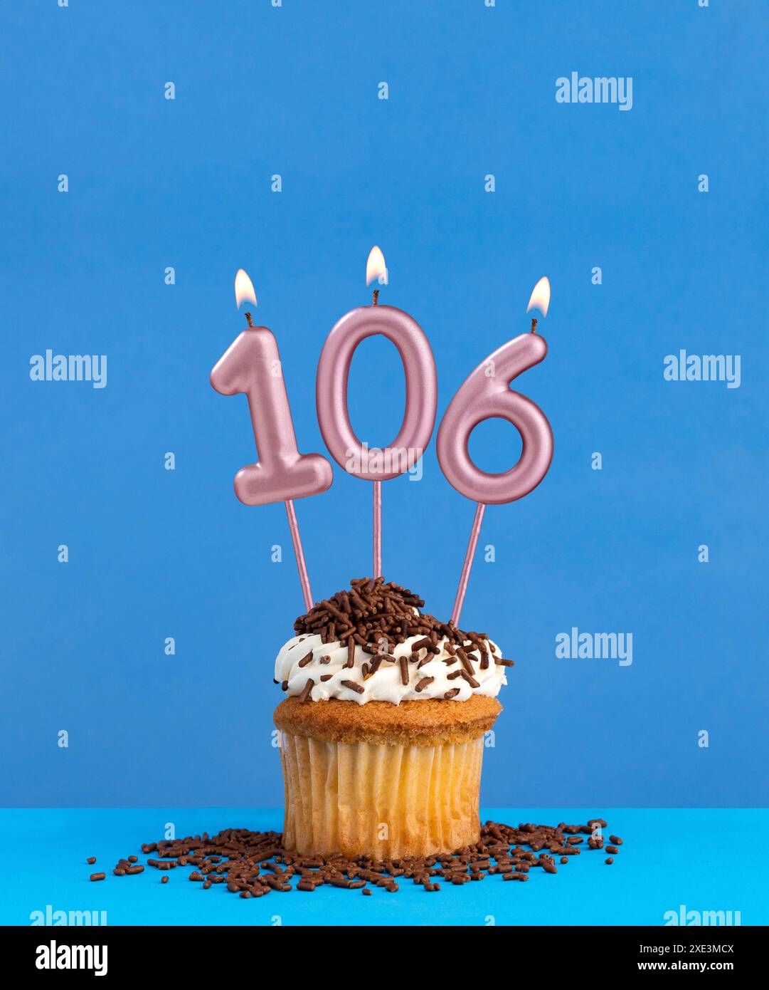 Candle number 106 - Birthday card with cupcake on blue background Stock ...