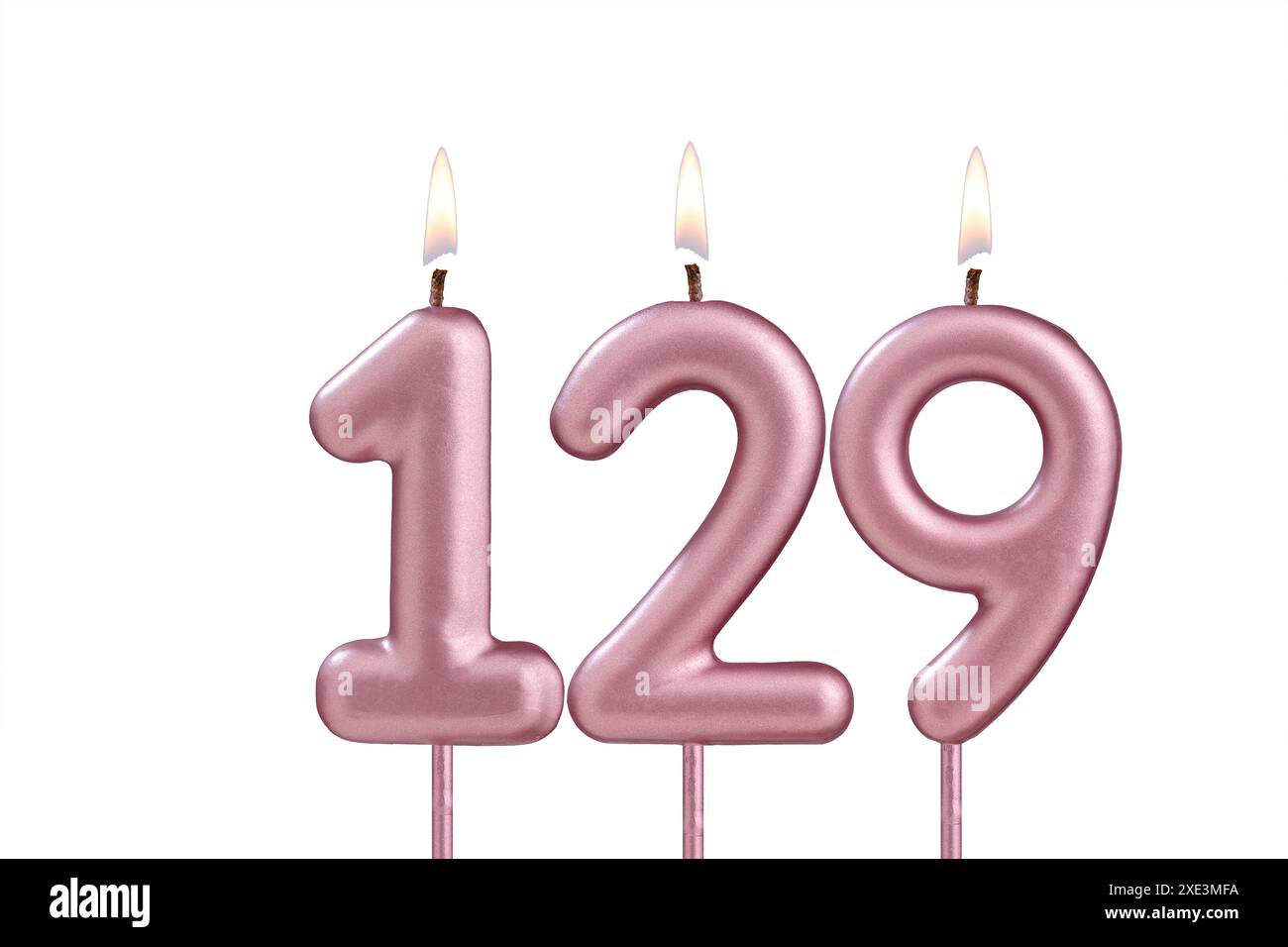 Candle number 129 - Lit birthday candle on white background Stock Photo ...