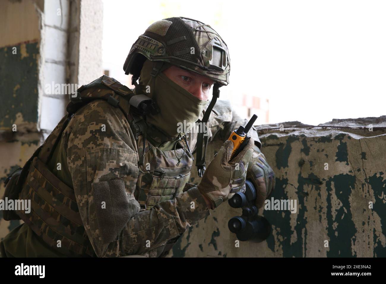 Military mission. Soldier in uniform with radio transmitter inside ...