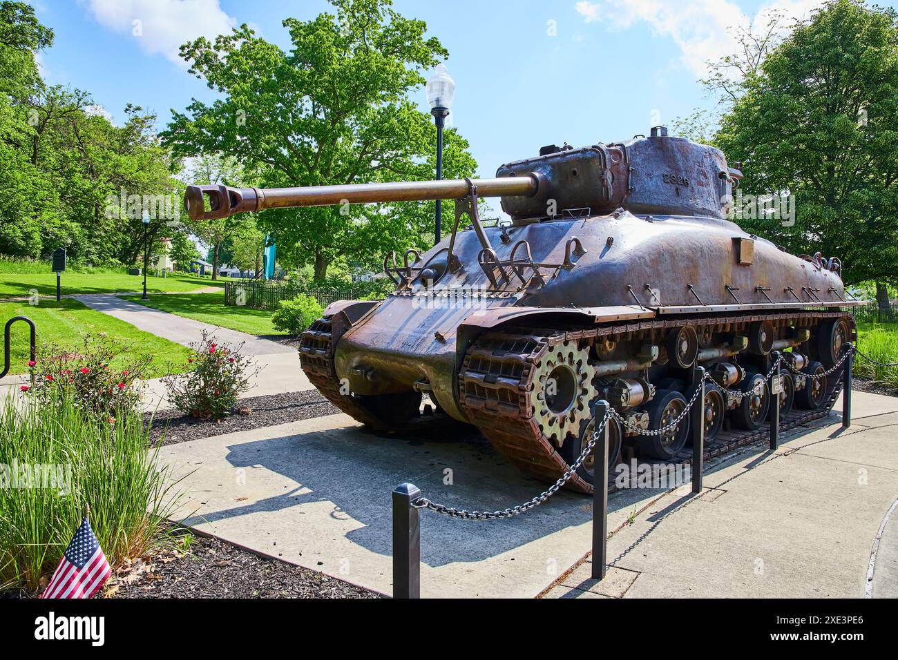 Vintage Military Tank in Park with American Flag Perspective Stock ...