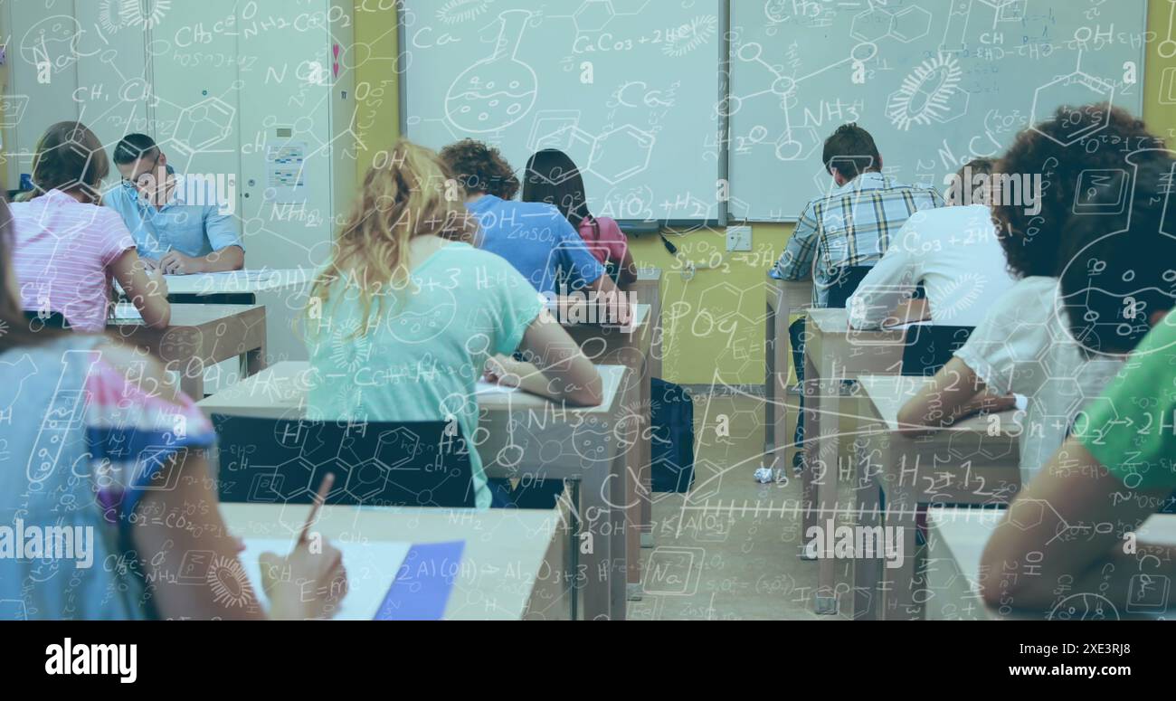 Image of chemical equations against rear view of diverse students studying in class at college ...