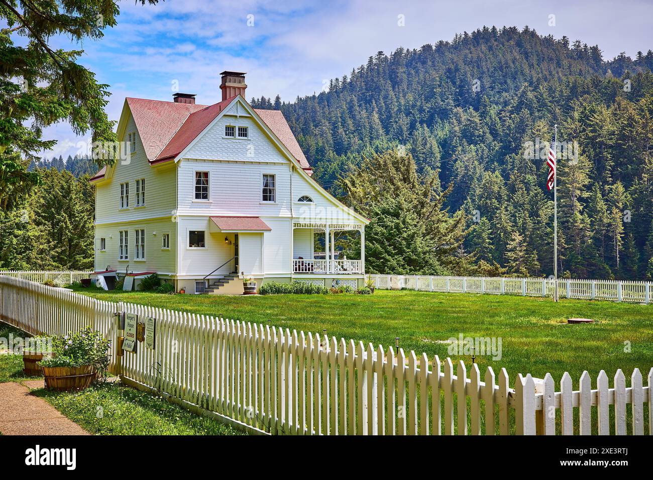 Two story suburban house with red roof and porch hi-res stock ...