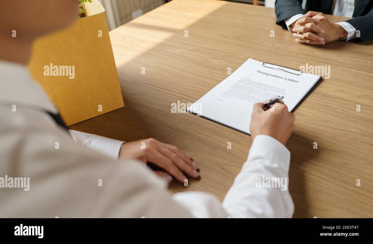 Quit Job Business man sending resignation letter and packing Stuff ...