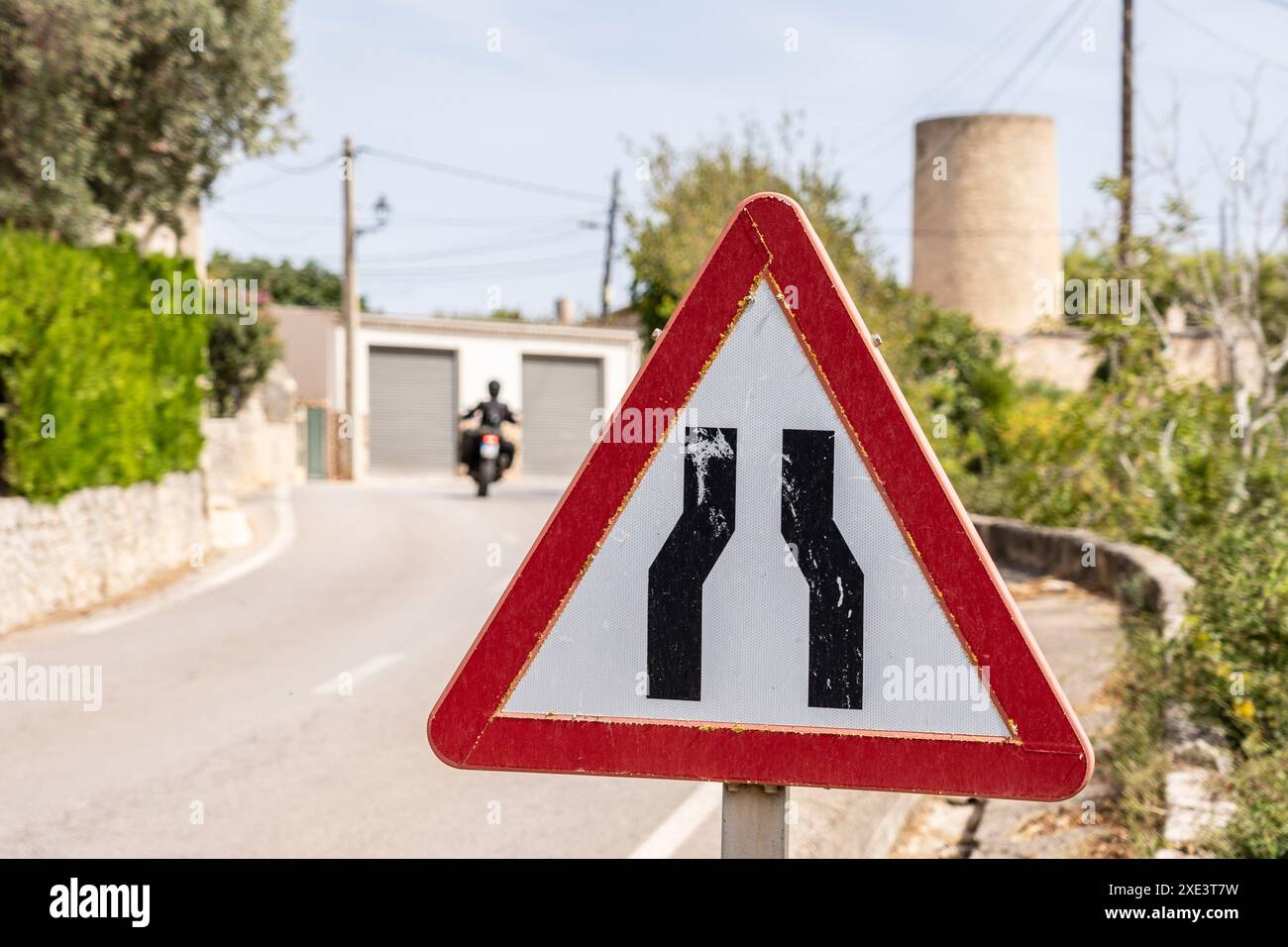 Road narrowing traffic sign Stock Photo - Alamy