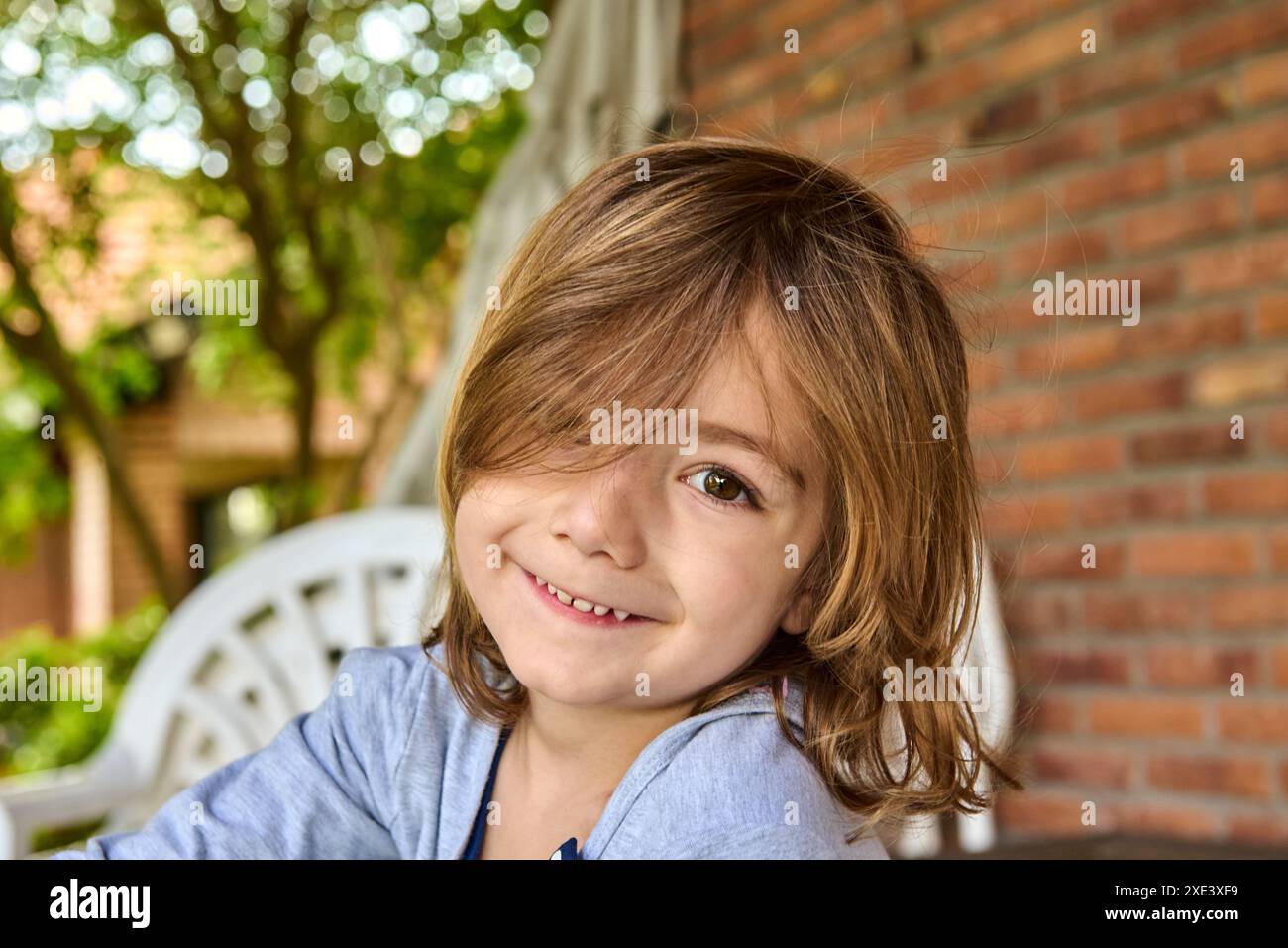 Child straight hair hair bangs hi-res stock photography and images - Alamy