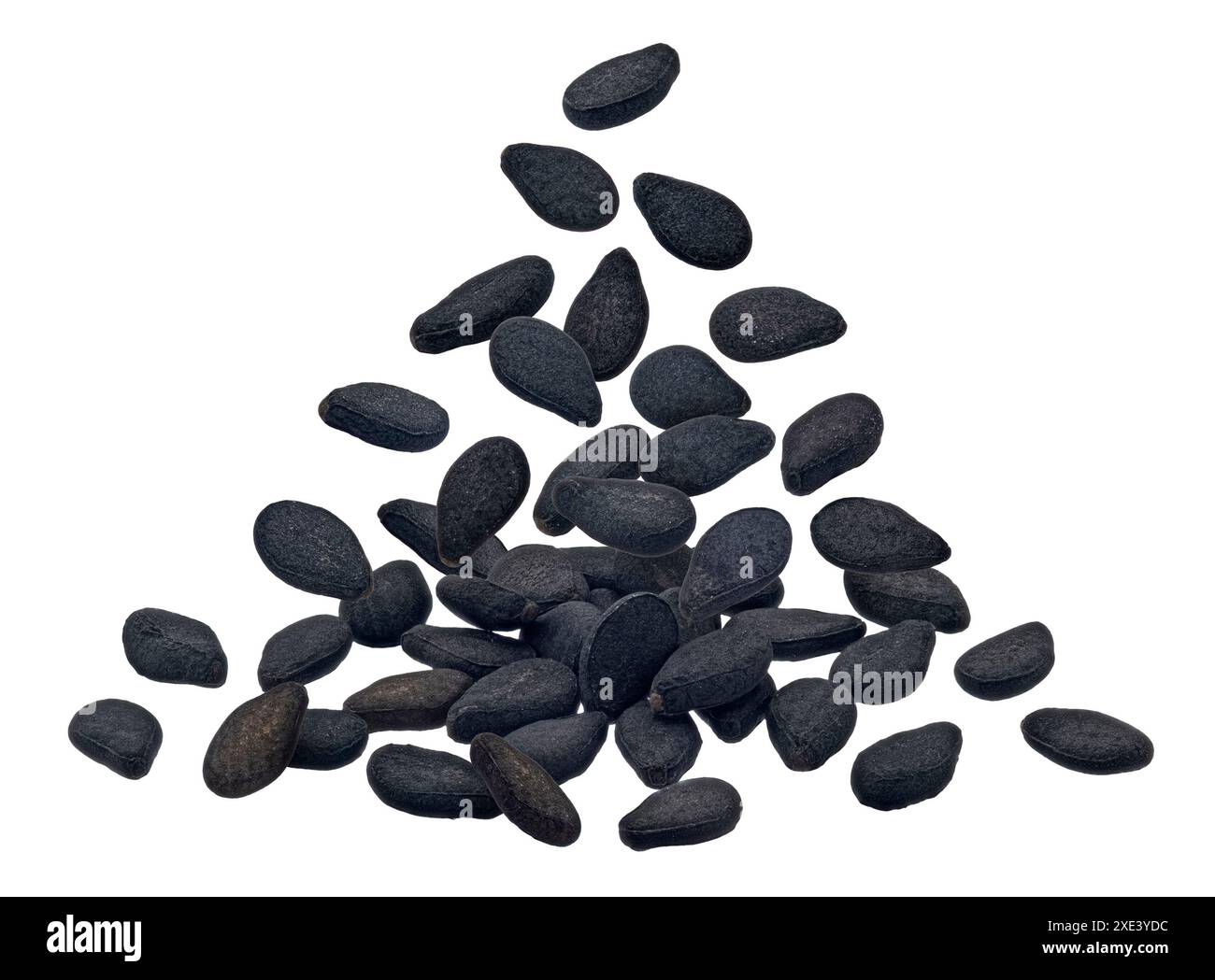 Falling black sesame seeds isolated on white background Stock Photo - Alamy