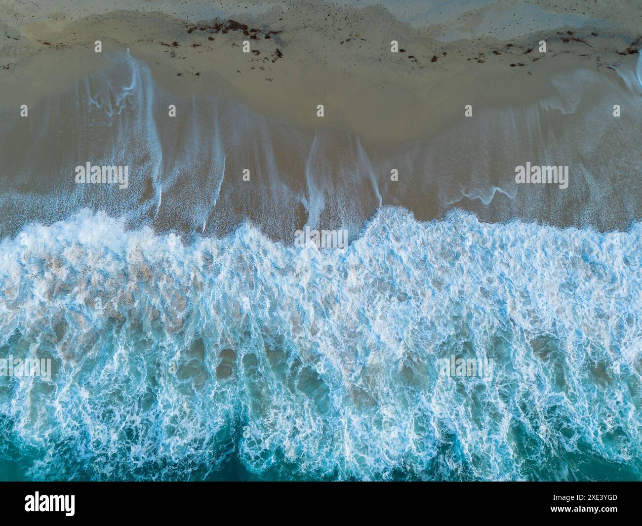 Top down view of the golden sand Rotonda Beach in Tropea with turquoise ...