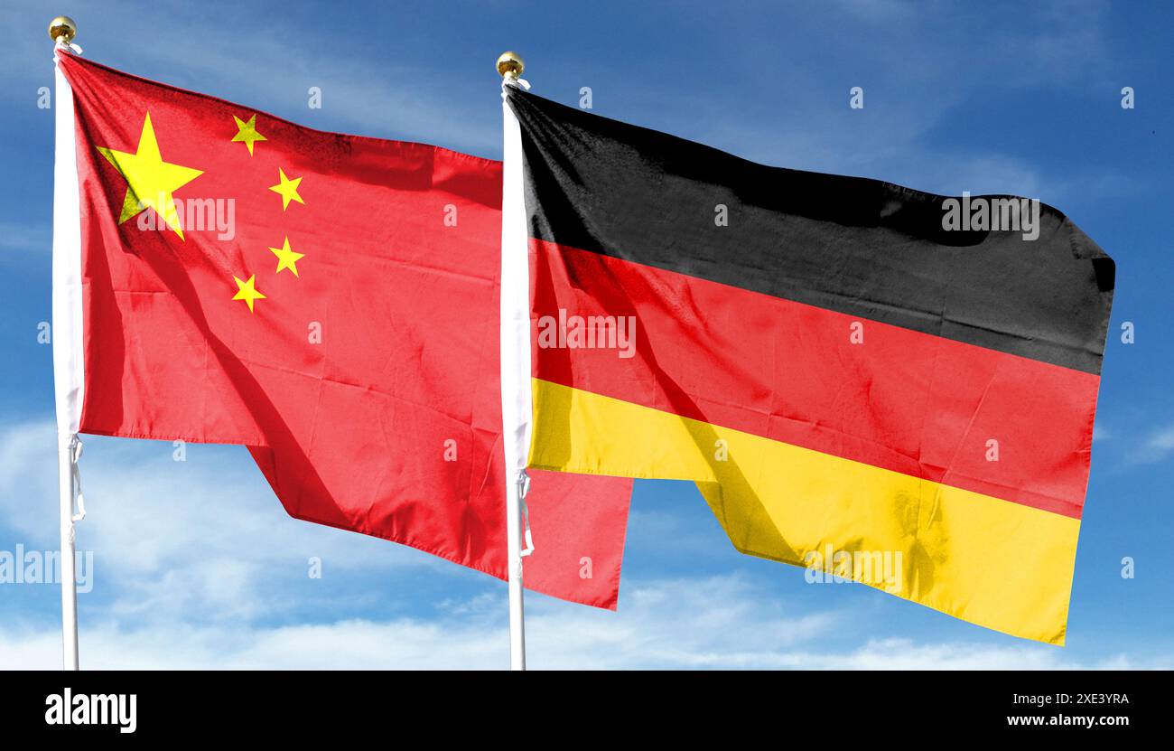 Chinese flag and German flag on cloudy sky. waving in the sky Stock ...