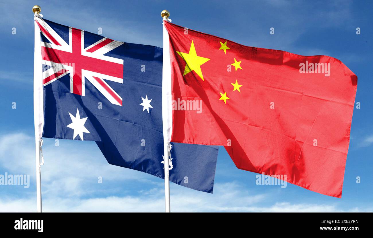 China and Australia flags against cloudy sky. waving in the sky Stock ...