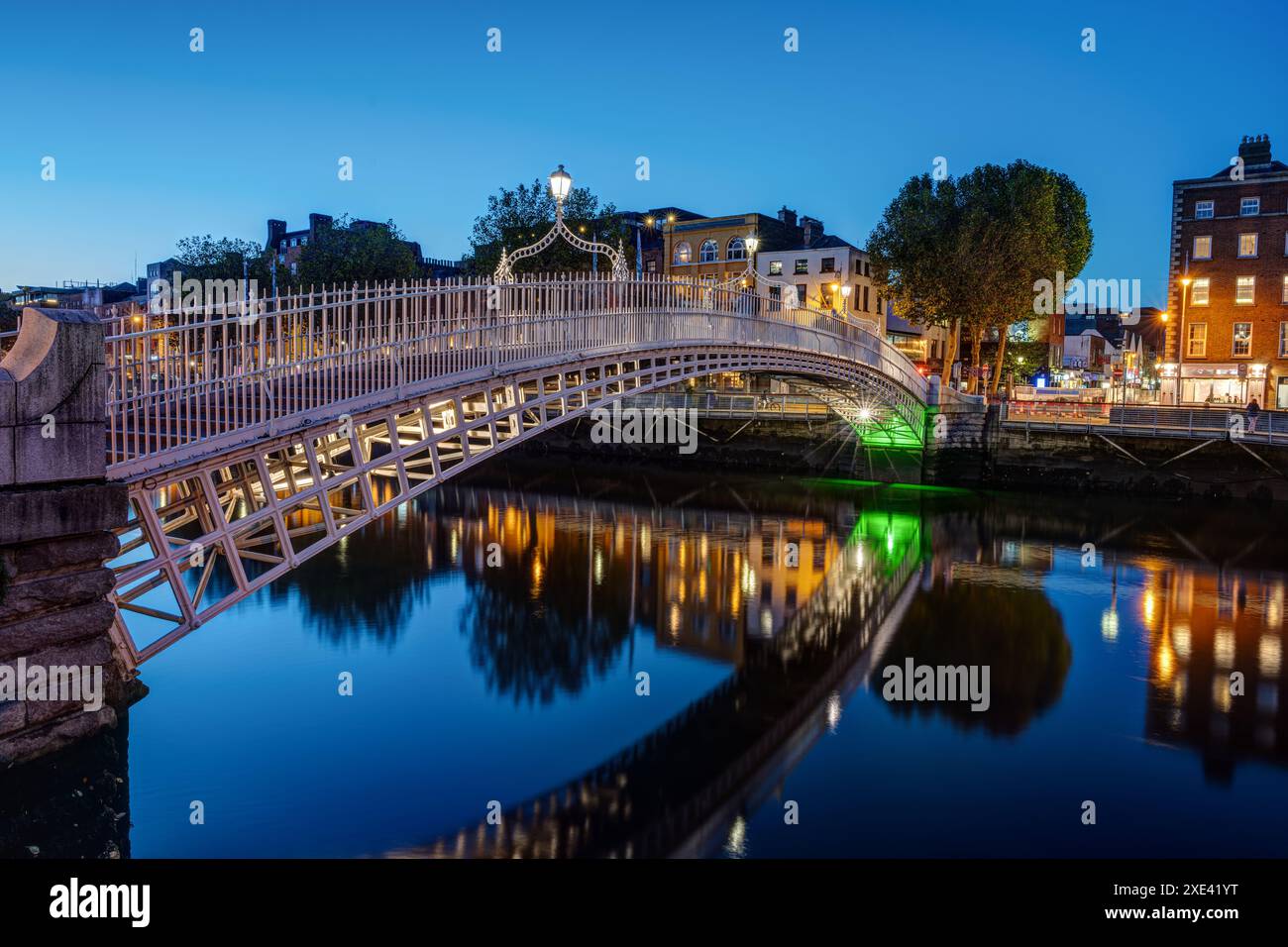 The famous Ha'penny Bridge in Dublin, Ireland, at twilight Stock Photo ...