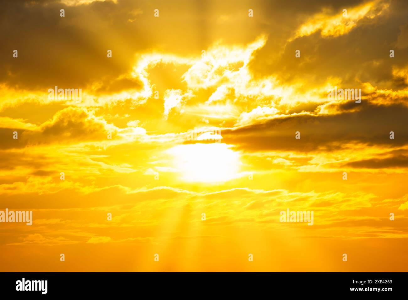 Sunset sky with sunset clouds and sun rays Stock Photo - Alamy
