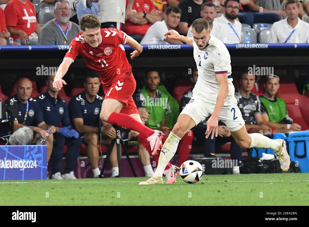 MUNICH, GERMANY - JUNE 25: Andreas Skov Olsen of Denmark and Strahinja Pavlovic of Serbia during ...