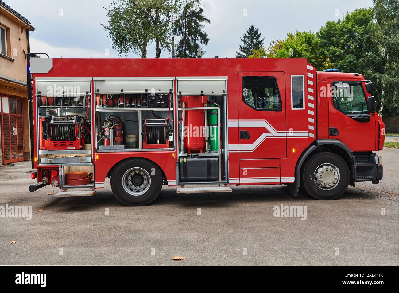 A state-of-the-art firetruck, equipped with advanced rescue technology ...